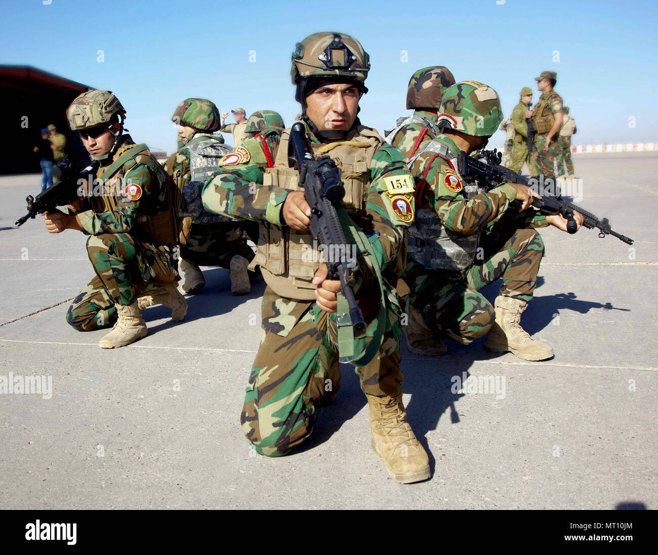 Iraqi army rangers conduct 360 degree fire protection during air mobile ...