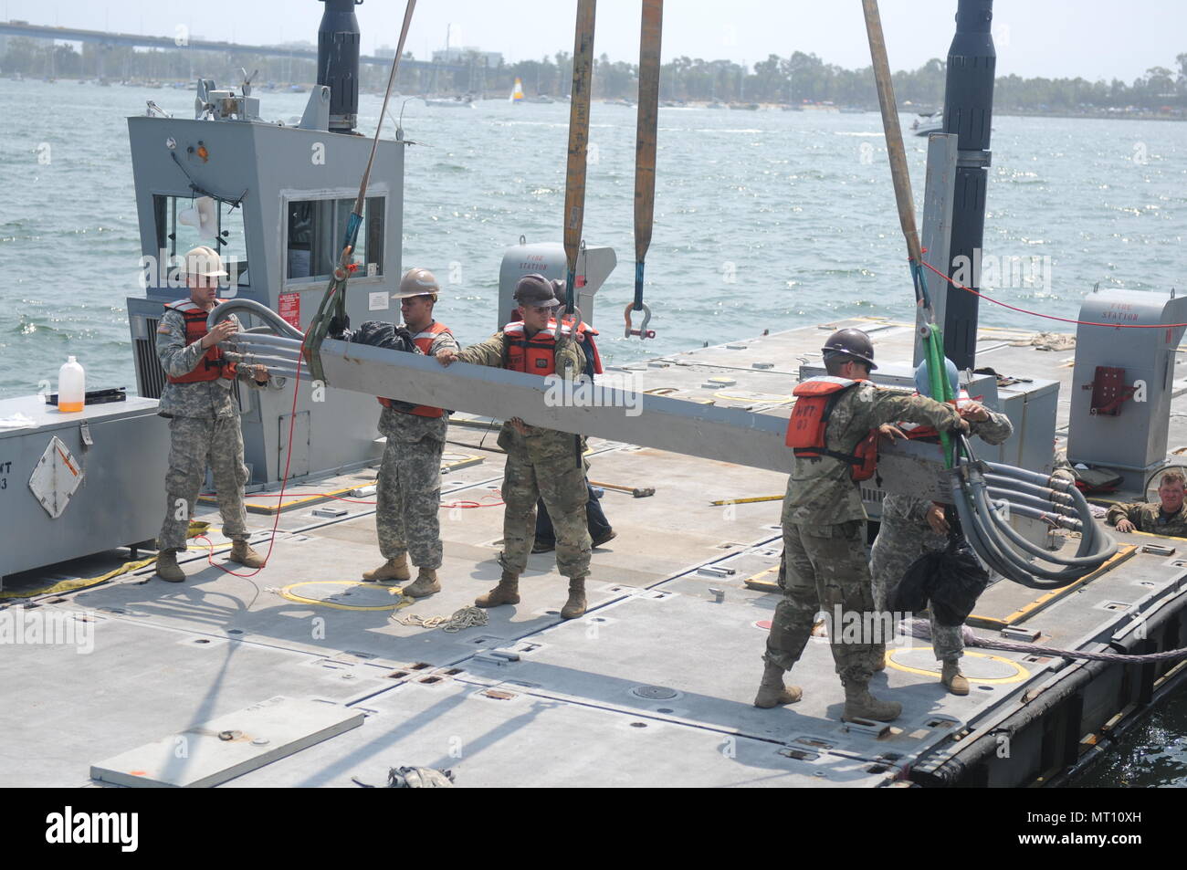 Soldiers of the 331st Transportation Company (Causeway) assemble a ...