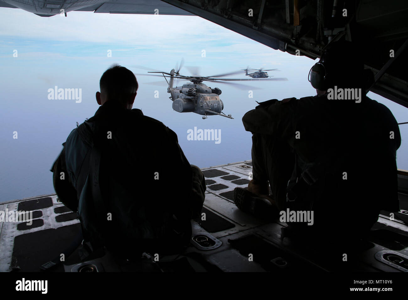 U.S Marine Corps Lance Cpl. Trystan Y. Jordan, left, with Combat Camera ...