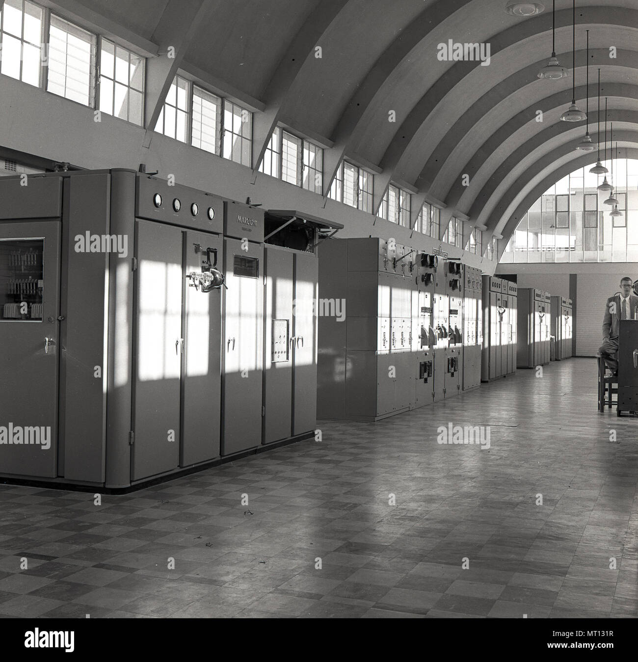 1950s, interior view showing a number of large wireless radio ...