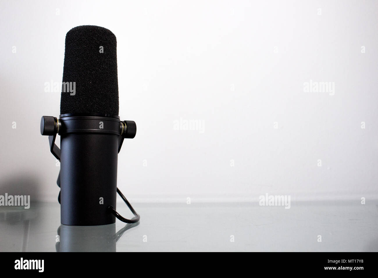 Sound studio. Microphone in close-up, Microphone isolated on white ...