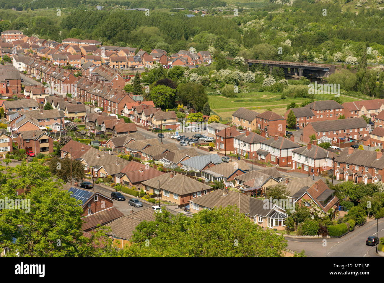 Elevated view of a British suburban neighborhood with rows of houses ...