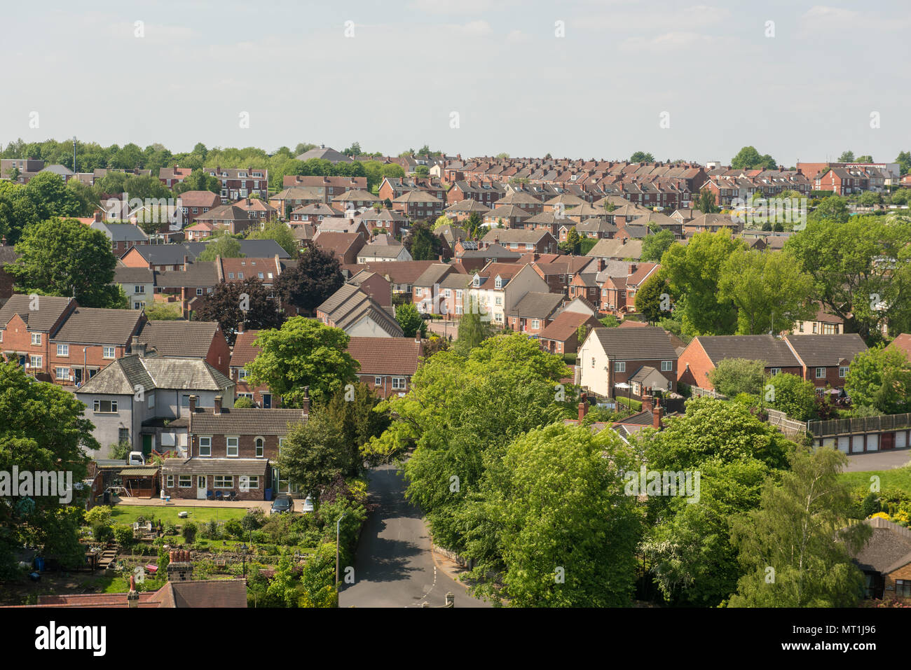 Elevated view of a British suburban neighborhood with rows of houses ...
