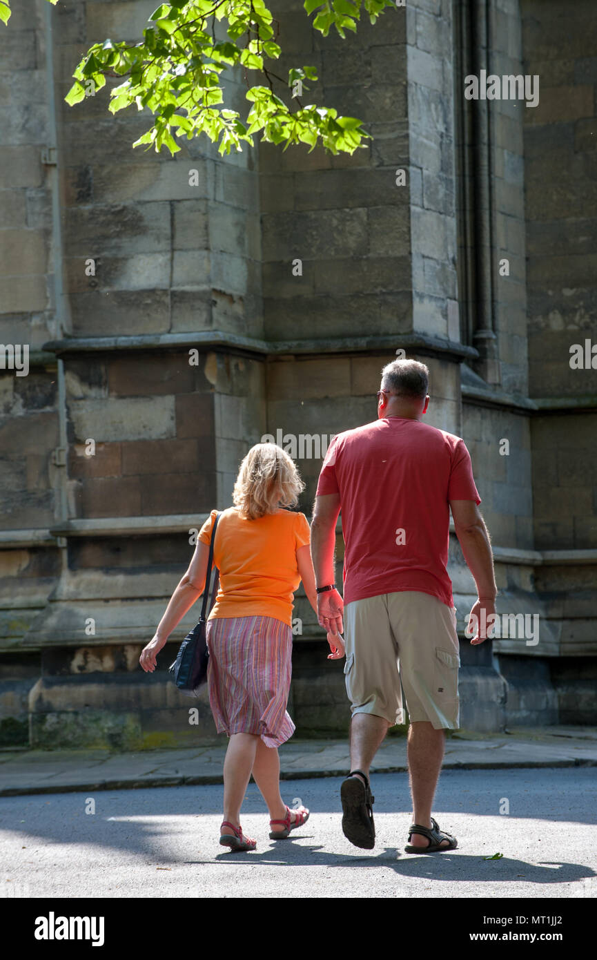 Back of people walking Stock Photo - Alamy