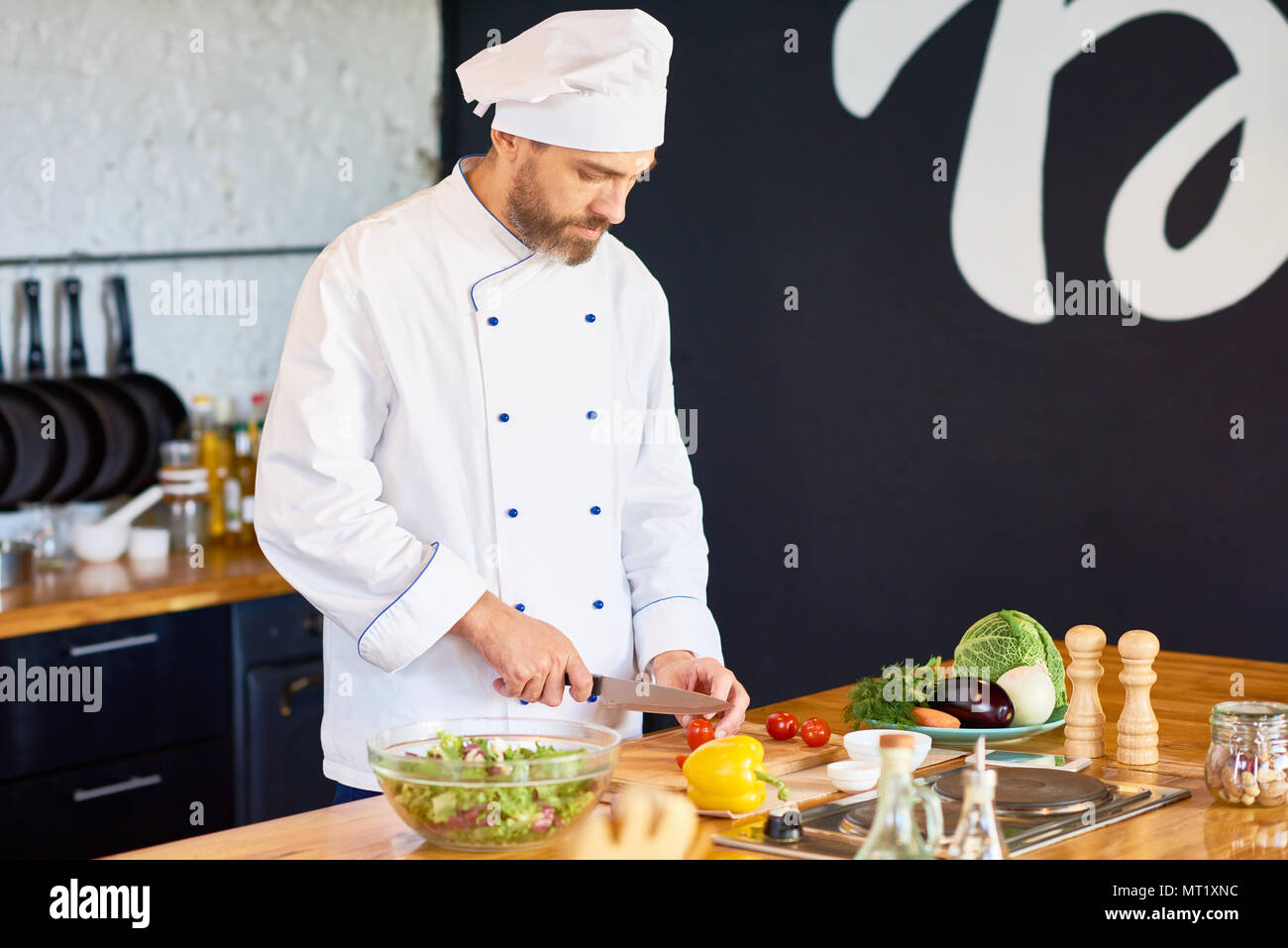 Chef making fresh vegetable salad hi-res stock photography and images ...
