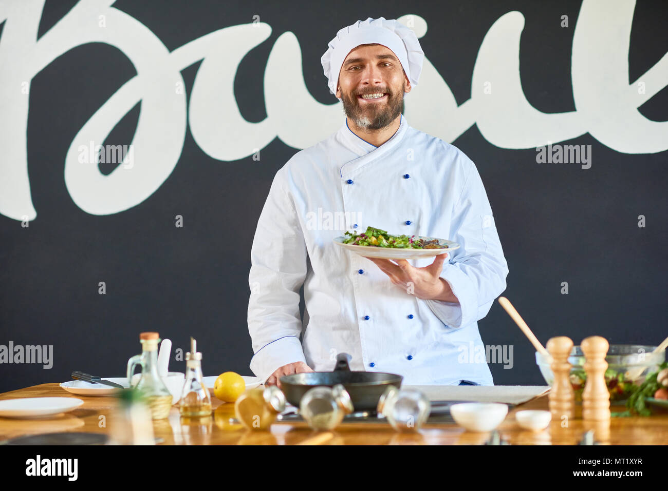 Chef with salad Stock Photo - Alamy
