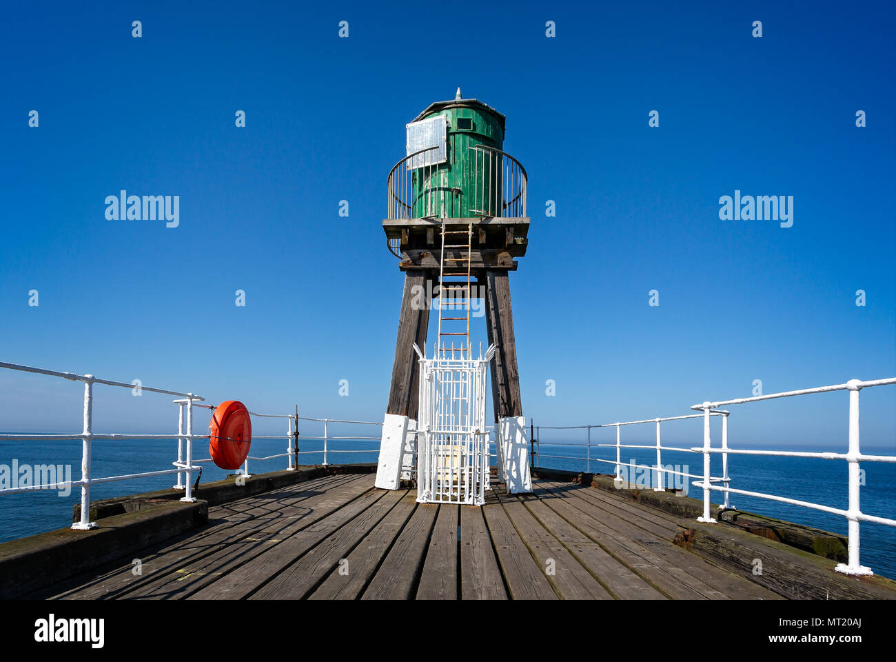 Green warning beacon on Whitby west pier taken at Whitby, Yorkshire, UK ...