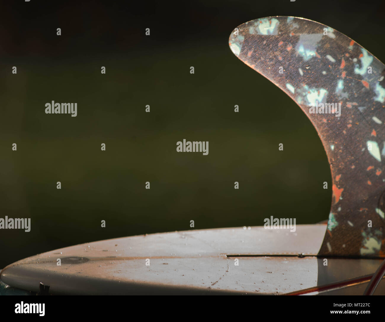 surfboard deck with water beads sunset Stock Photo - Alamy