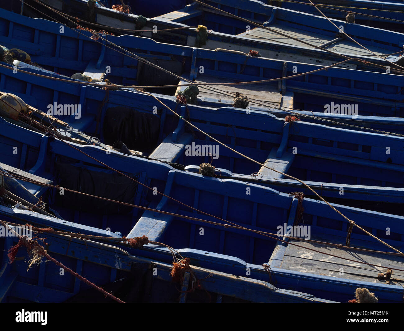Wooden boats tied together hi-res stock photography and images - Alamy