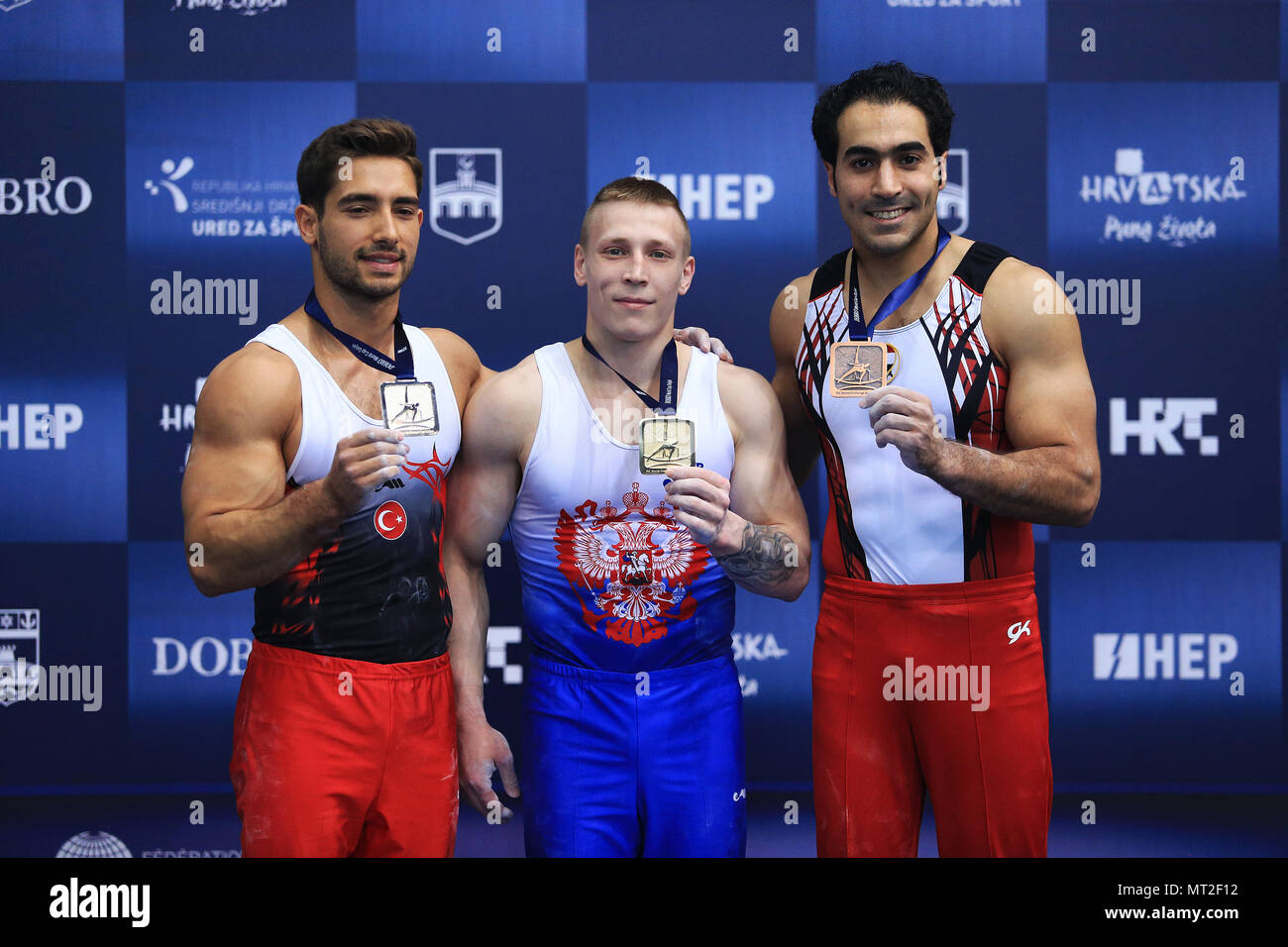 Osijek, Croatia. 27th May, 2018. Gold medalist Denis Abliazin (C) of ...