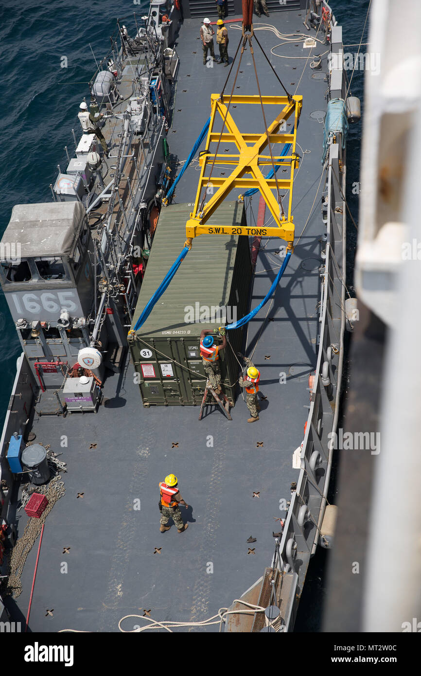 US Navy Sailors with Assault Craft Unit 1 (ACU1) on a Landing Craft ...