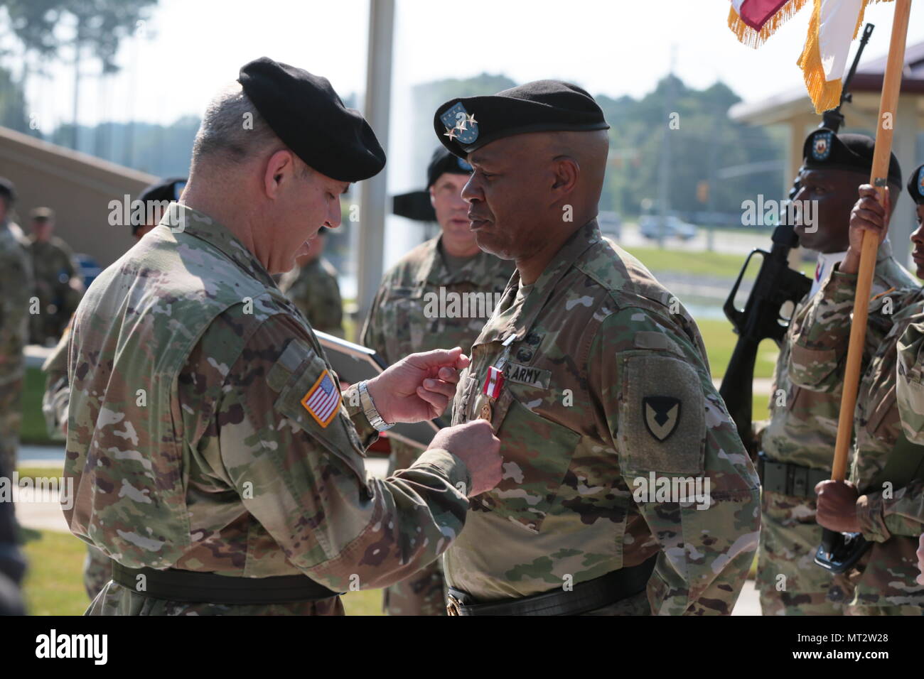 U.S. Army Gen. Gus Perna, Army Materiel Command commander, presents the ...