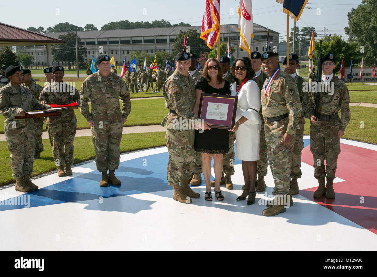 U.S. Army Gen. Gus Perna, Army Materiel Command commander, presents ...