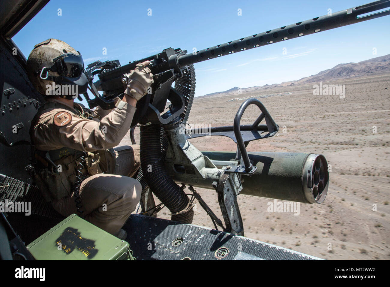 U.S. Marine Corps Staff Sgt. Ryan D. Peek, an aerial observer, with ...