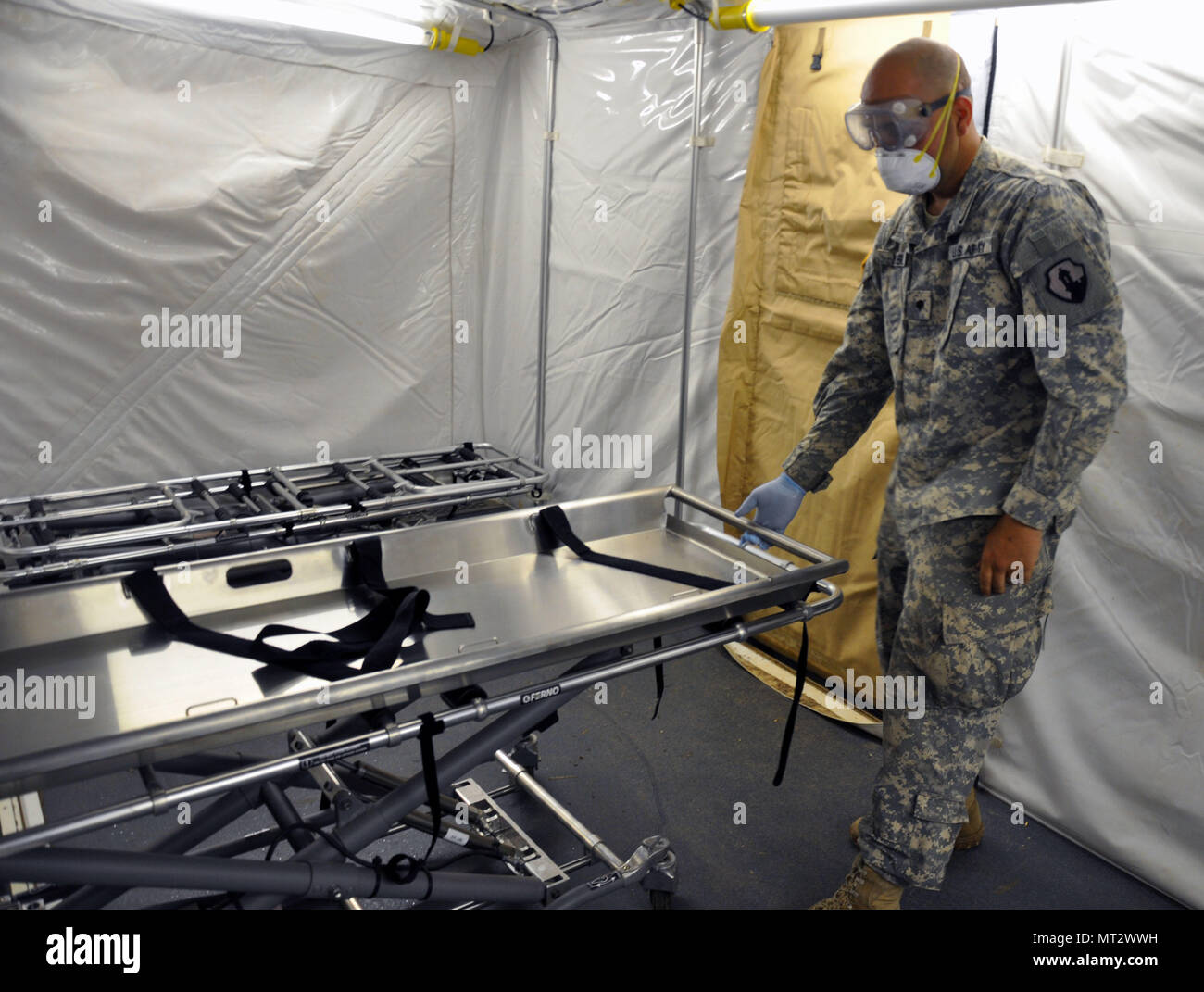 Spc. Christopher Myers, a mortuary affairs specialist with the 311th ...