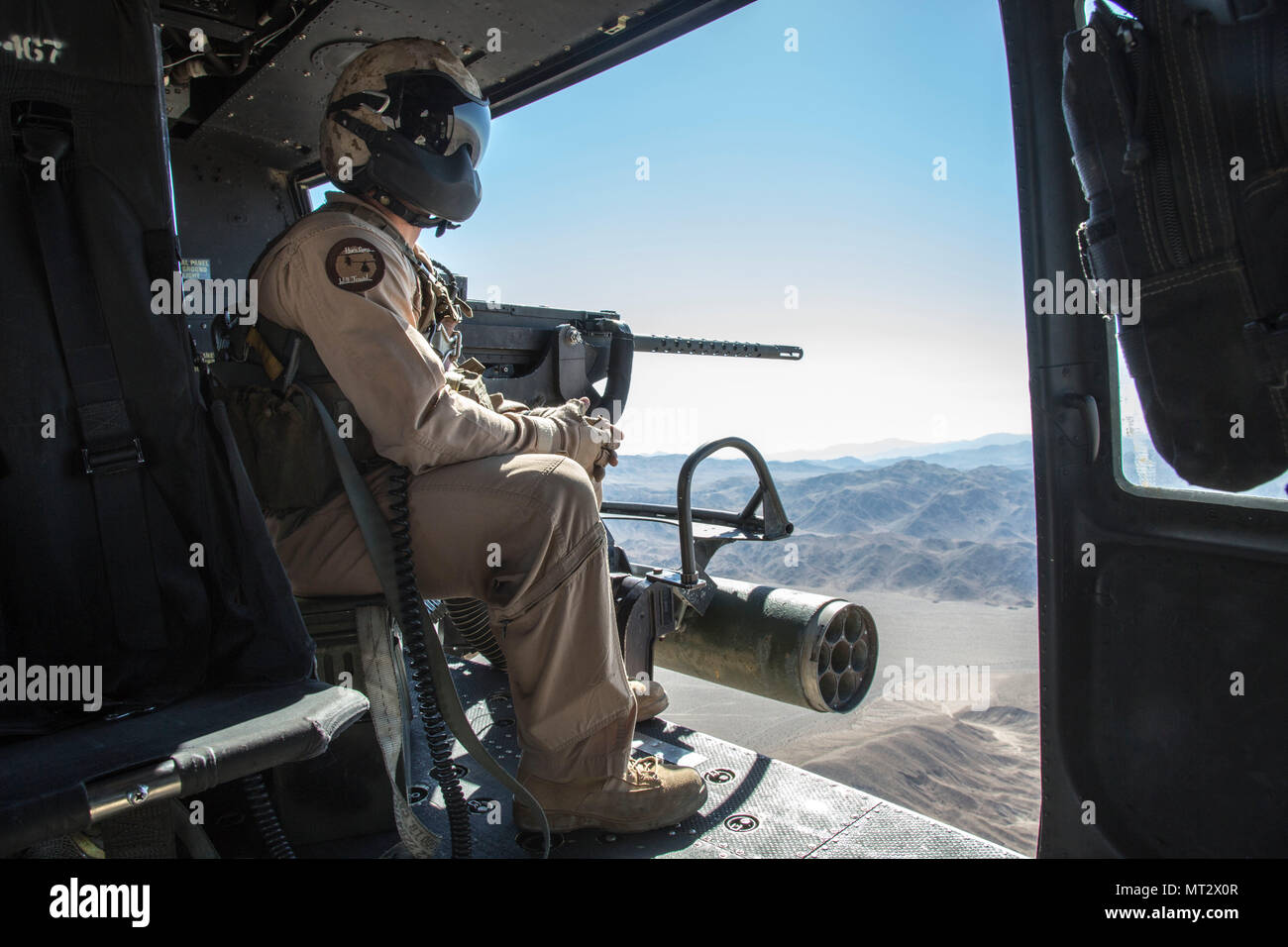 U.S. Marine Corps Staff Sgt. Ryan D. Peek, an aerial observer, with ...