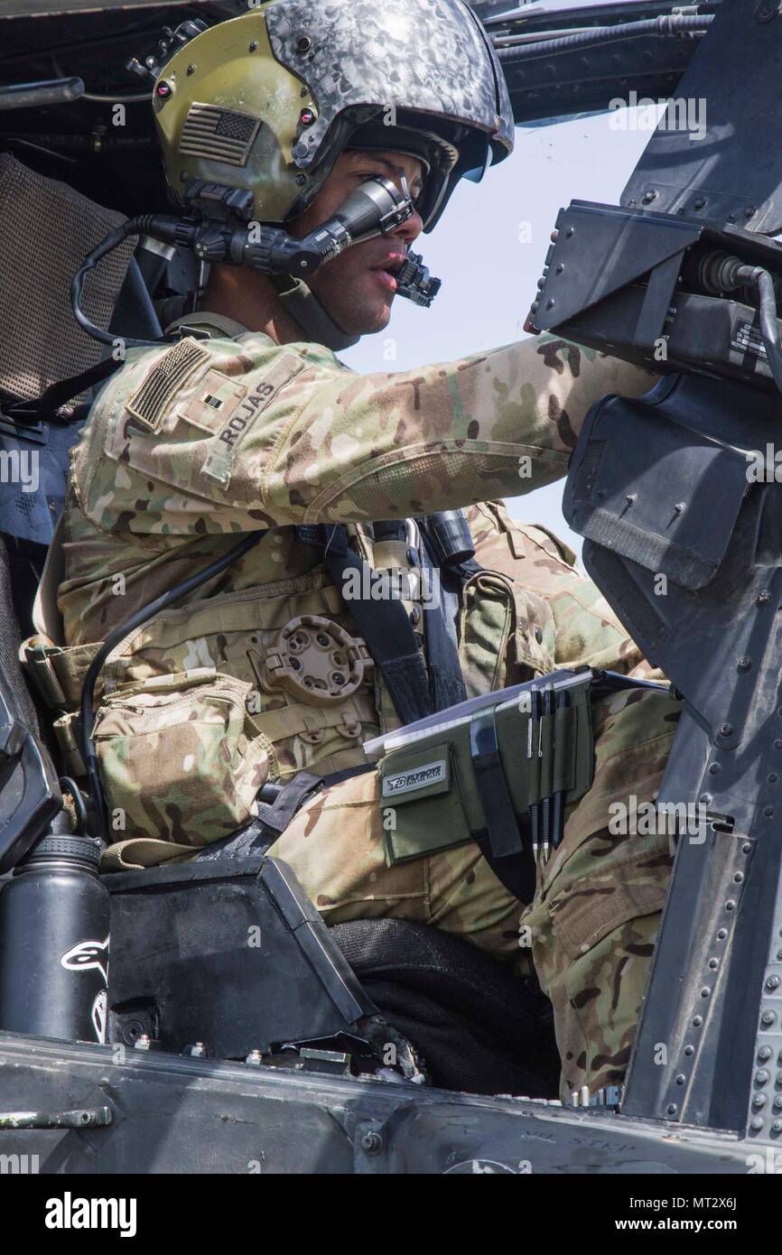 Chief Warrant Officer 3 Stephen Rojas, an AH-64 Apache helicopter pilot ...