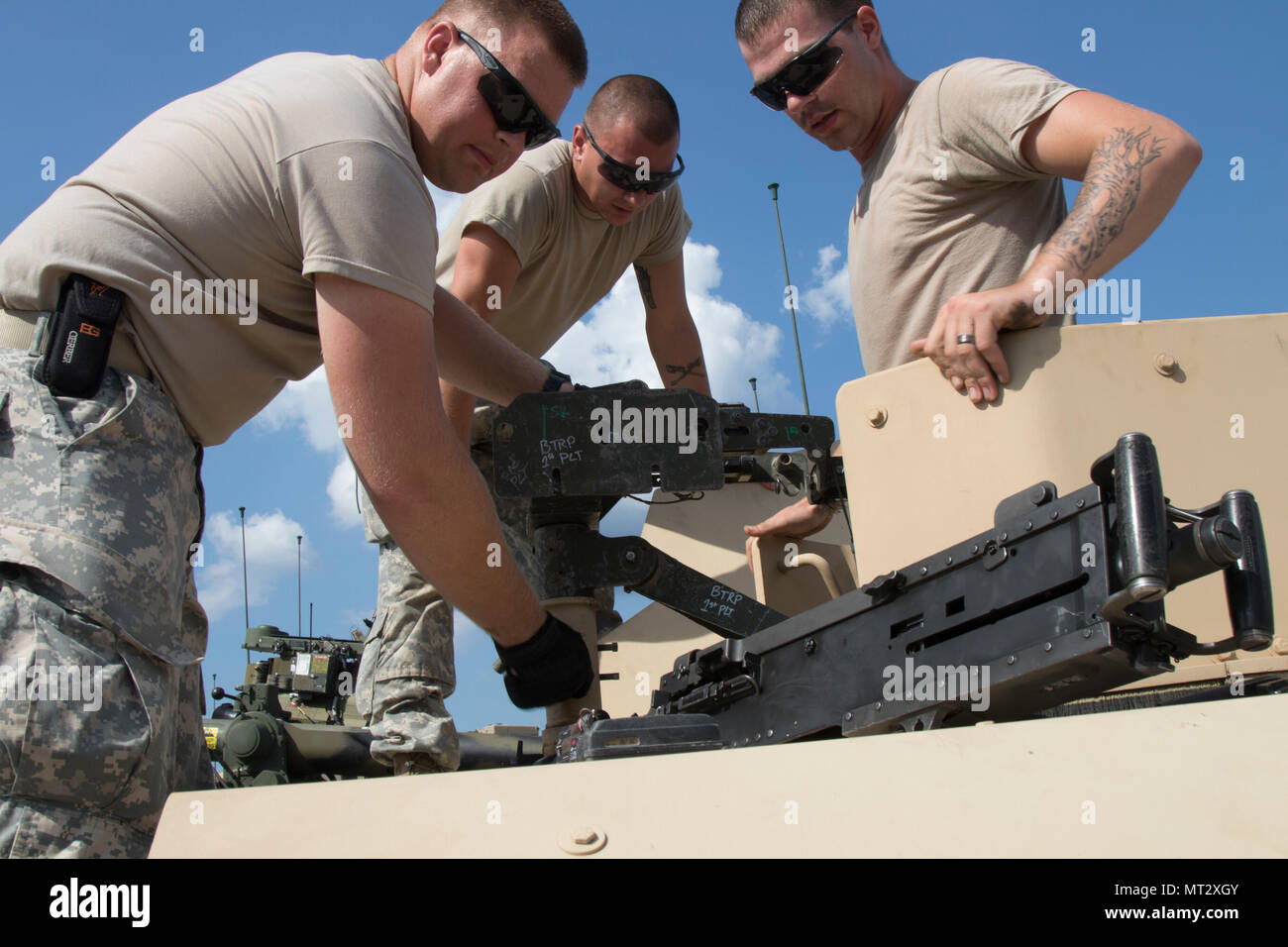 Spc. Jeremy Stuart, Spc. Jordan Raffaelli and Spc. Trace Collins, all ...