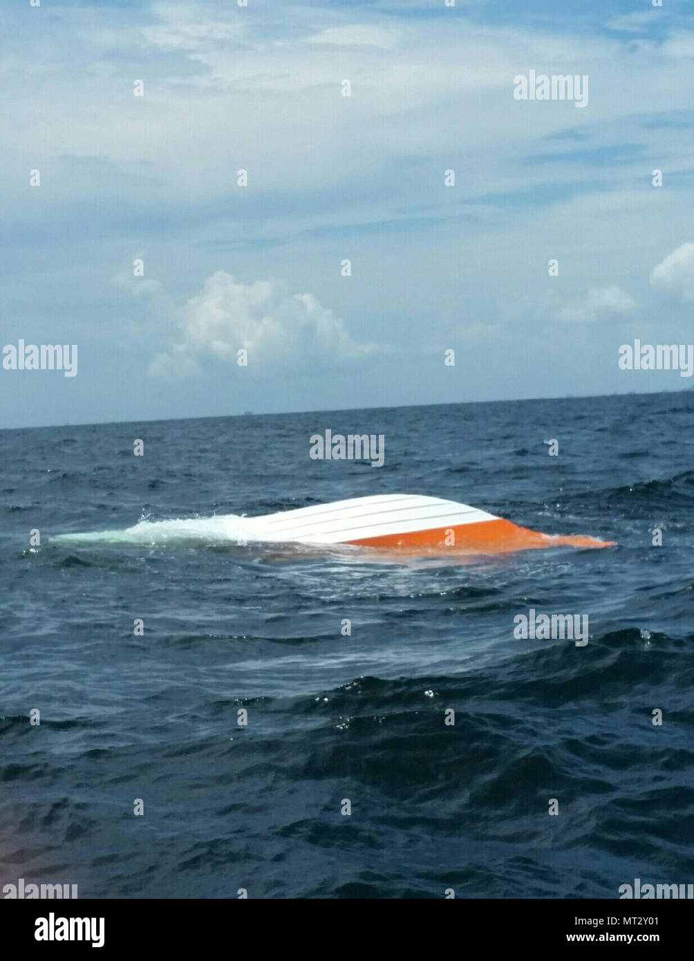 The crew of an oil/chemical tanker successfully rescued five people ...