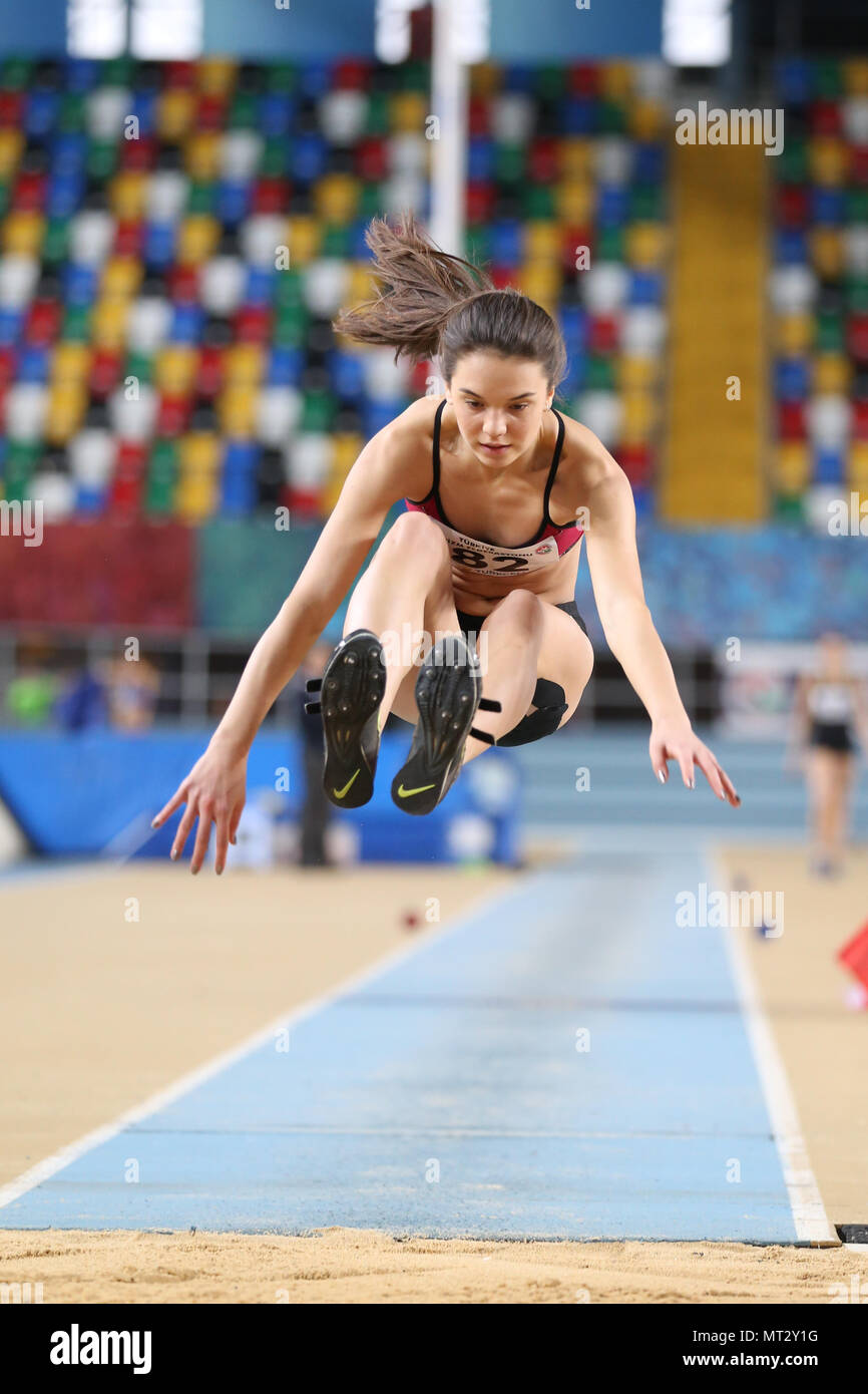 ISTANBUL, TURKEY - FEBRUARY 03, 2018: Undefined athlete triple jumping ...