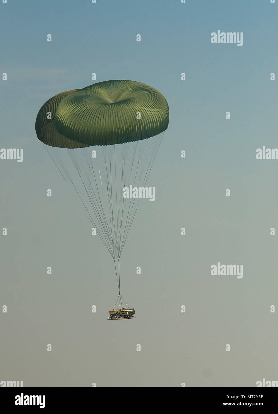 A U.S. Humvee descends to the drop zone during the 54th Brigade ...