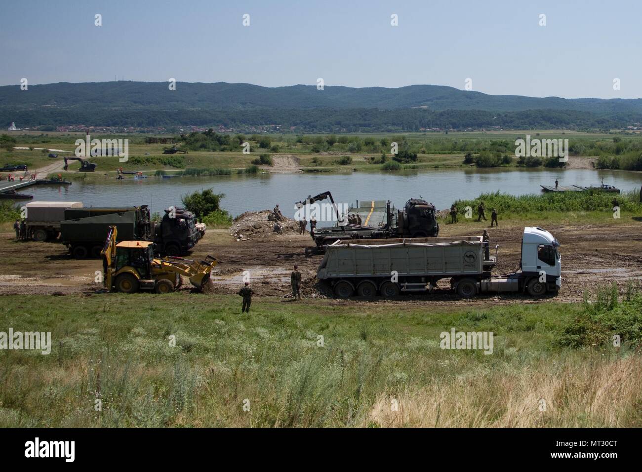 Engineers from136th Engineer Battalion, Romanian Land Forces bring in ...