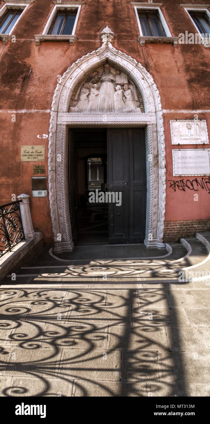 Shadow of wrought-iron railings and Venetian arched doorway, Venice ...