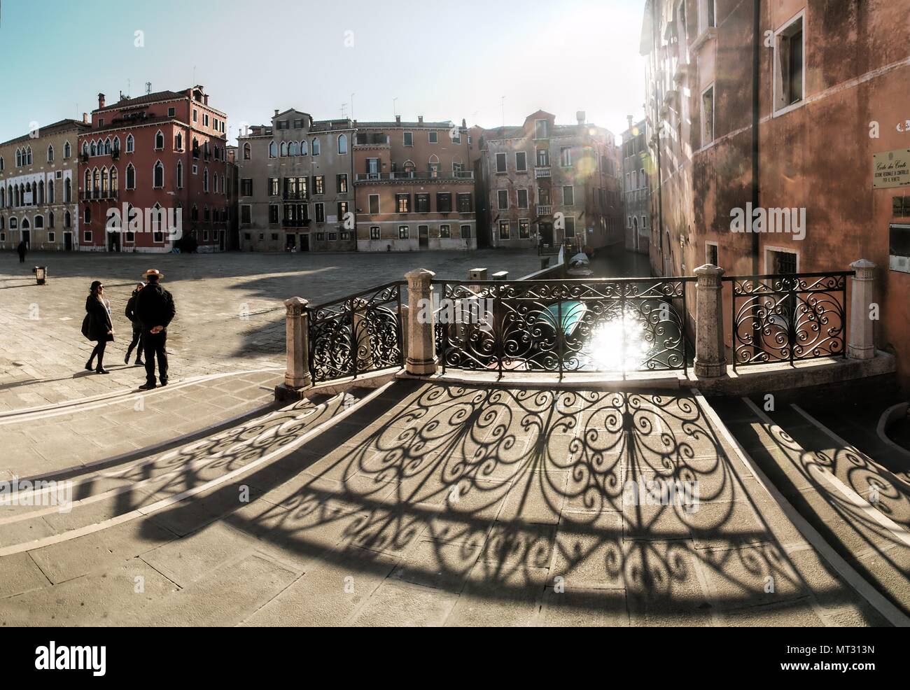 Shadow of wrought iron railing on Venetian bridge Stock Photo - Alamy