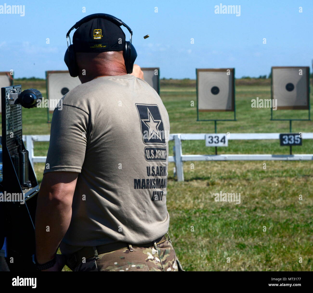 Camp Perry, Ohio—Sgt. 1st Class James Henderson fires his pistol during ...