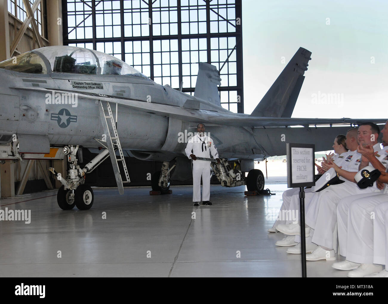 Avionics Division Leading Petty Officer AT1 Ahmad Zephir removes Capt ...