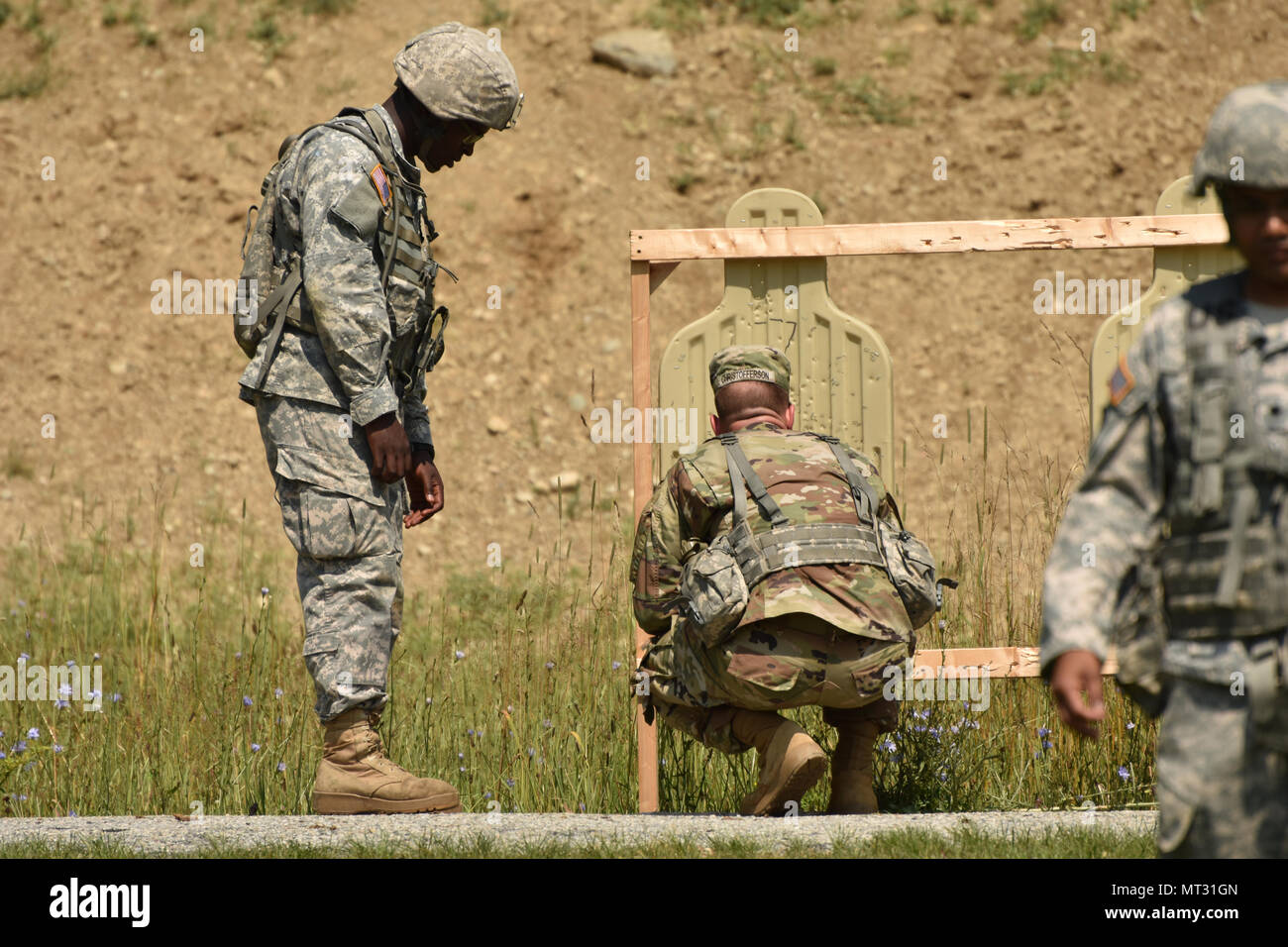 N.Y. Army National Guard Soldier, Staff Sgt. Mykel Christofferson(right ...