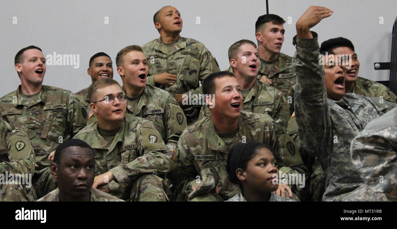 U.S. Army Alaska Soldiers cheer on the Army team July 21 at the second ...
