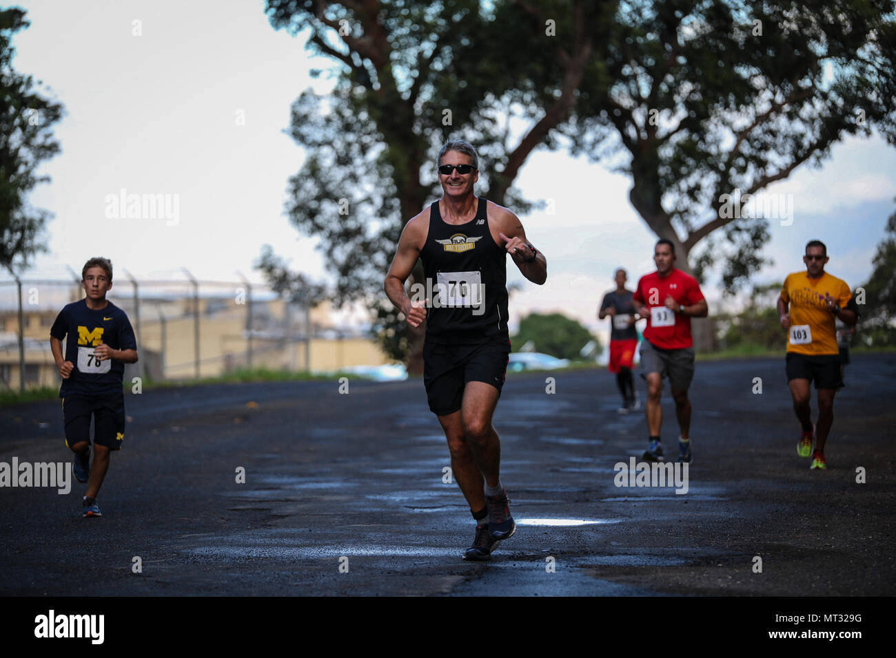 Runners hit the trails during the Camp Smith Grueler 5K aboard Camp H.M ...