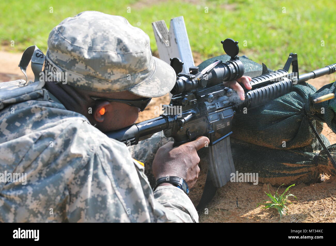 U.S. Army Reserve Spc. Matthew Roberts fires a round during weapons ...