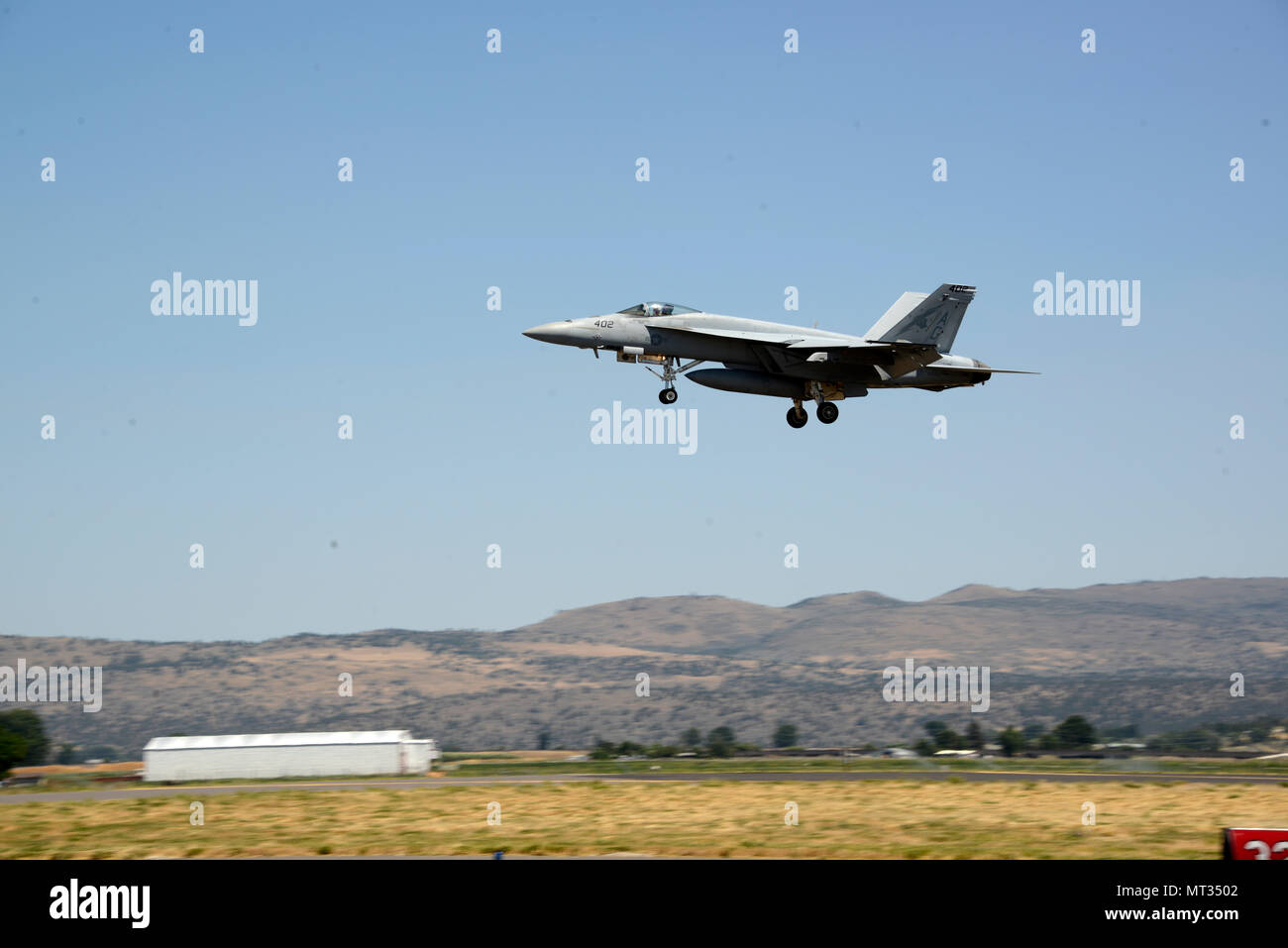A U.S. Navy F/A-18 Super Hornet assigned to VFA-25, Naval Air Station ...