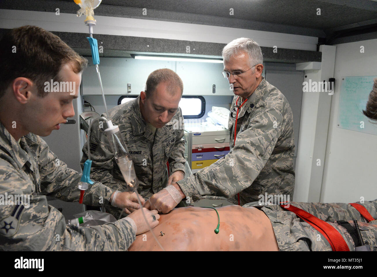 U.S. Air Force Lt. Col. Dwight Harley, right, gives instructions to ...