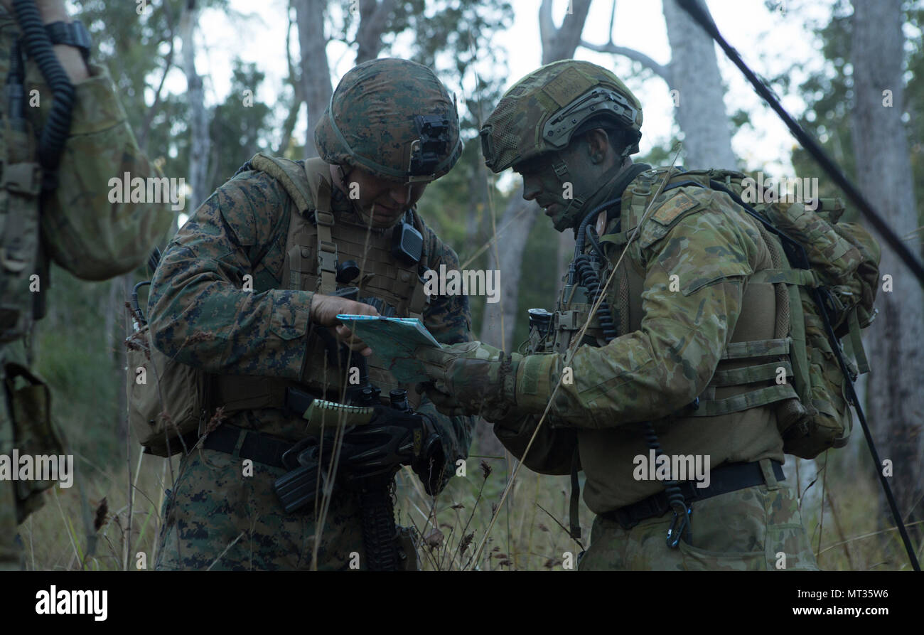 QUEENSLAND, Australia – U.S. Marine Capt. Thomas Schueman (left ...
