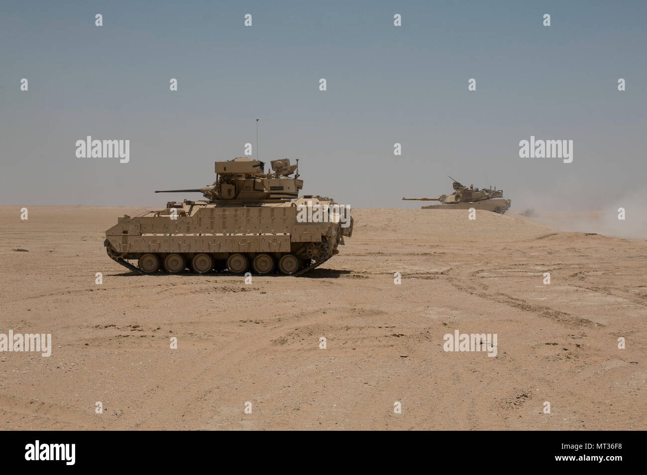 An M2A3 Bradley armored reconnaissance crew assigned to 6th Squadron ...