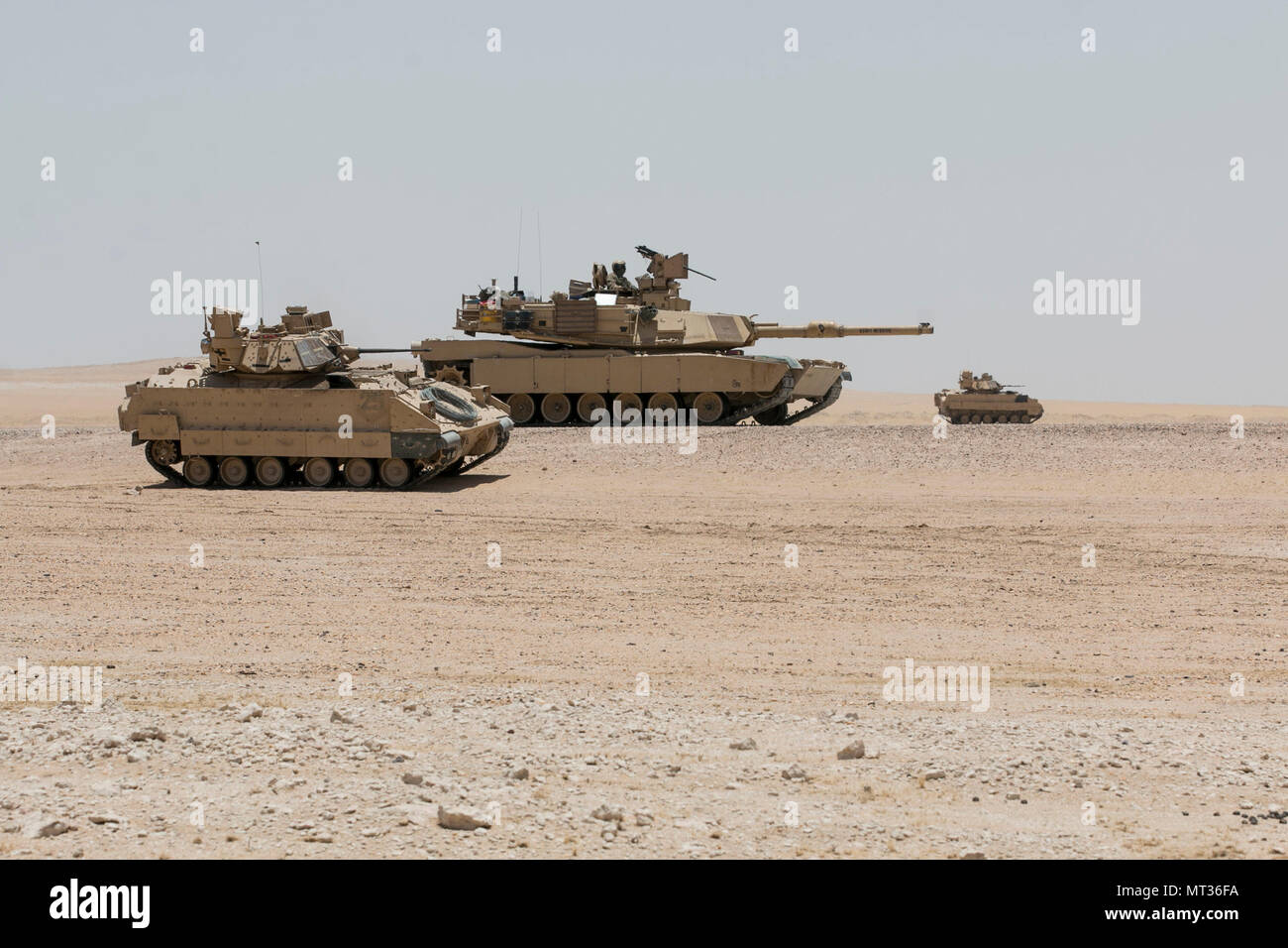 An M2A3 Bradley armored reconnaissance crew assigned to 6th Squadron ...