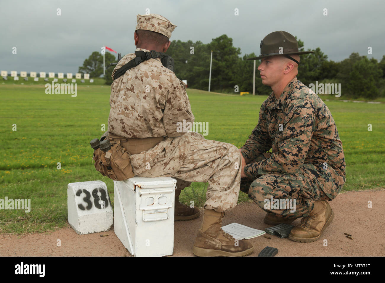 U.S. Marine Corps Sgt. Tyler Powell, primary marksmanship instructor ...
