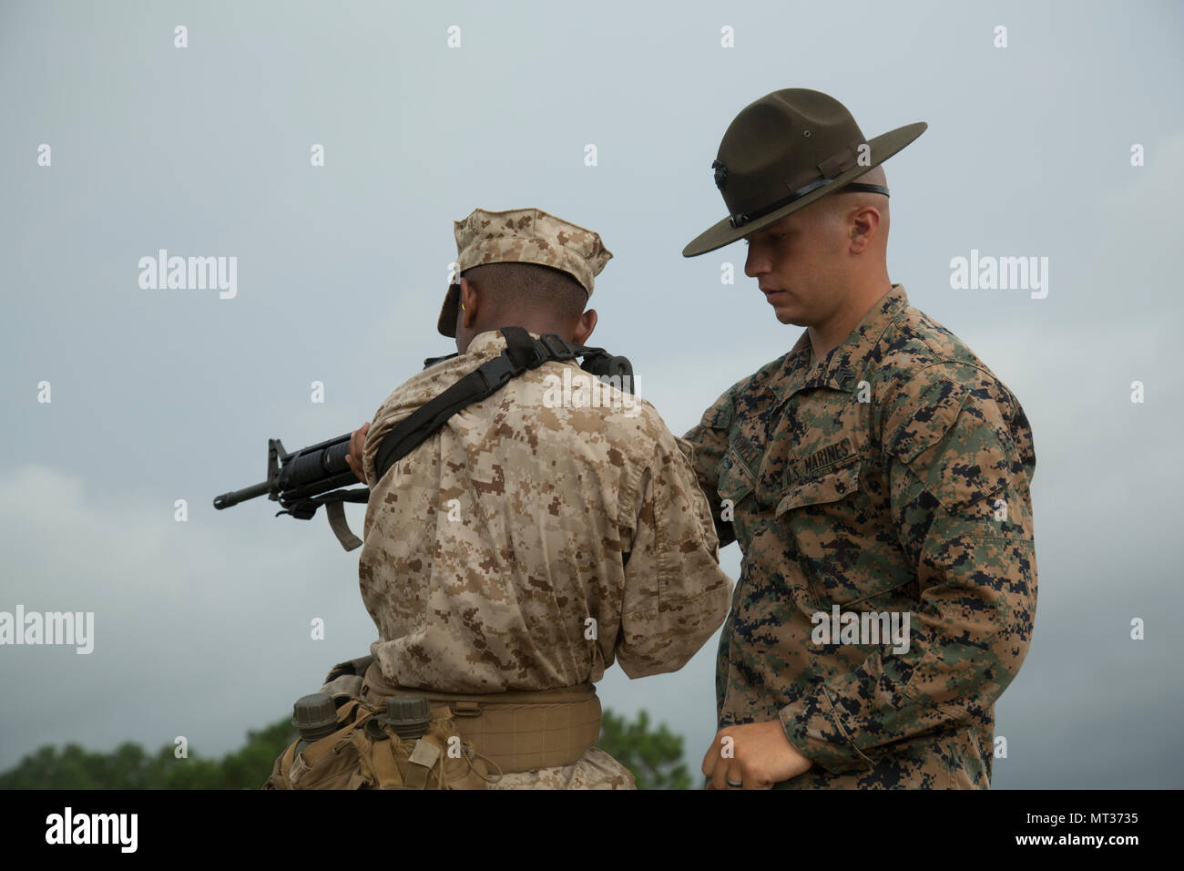 U.S. Marine Corps Sgt. Tyler Powell, primary marksmanship instructor ...