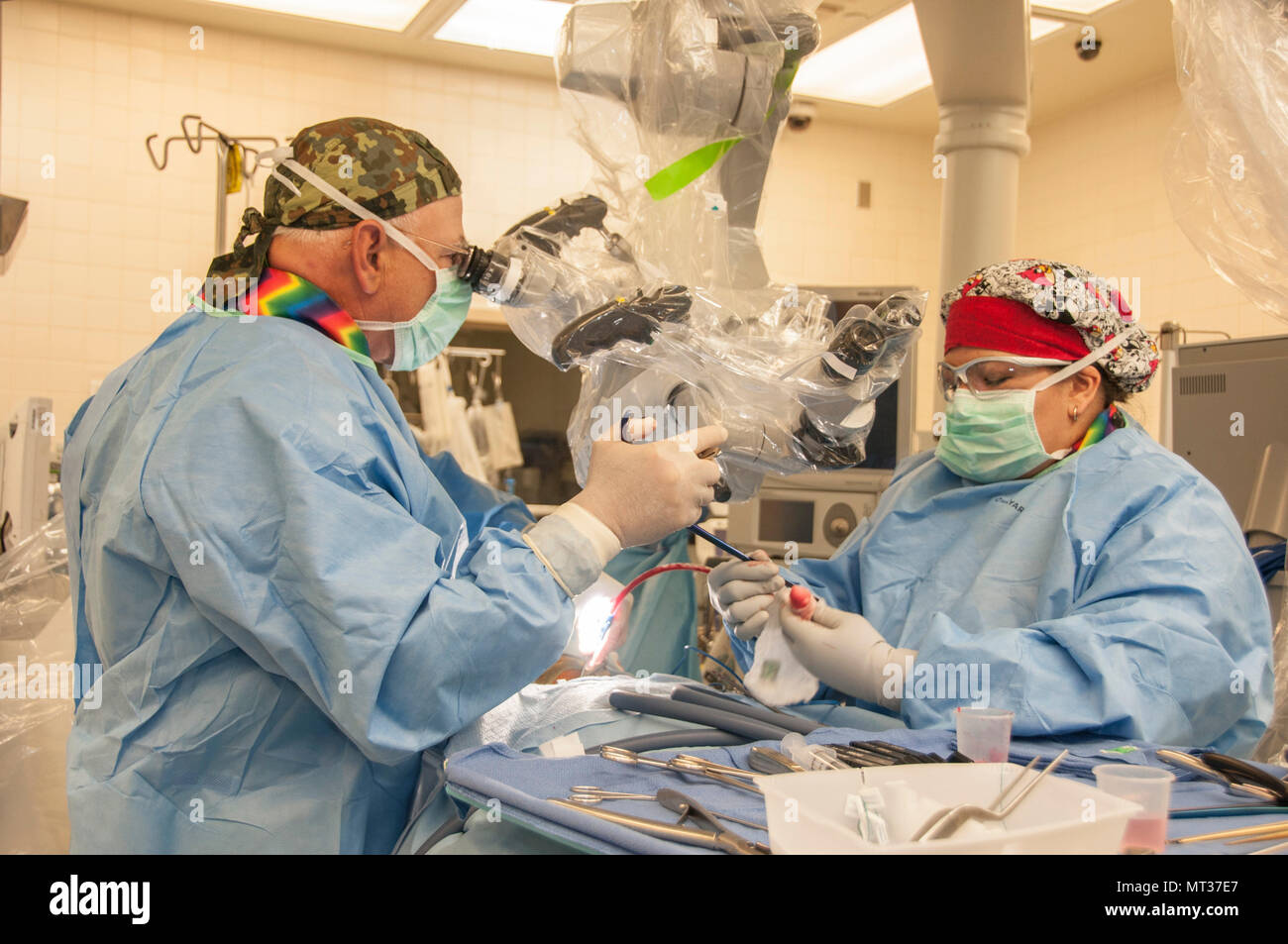 Dr. Pedro Caram Sr. (left), senior neurosurgeon, Neurology Clinic ...