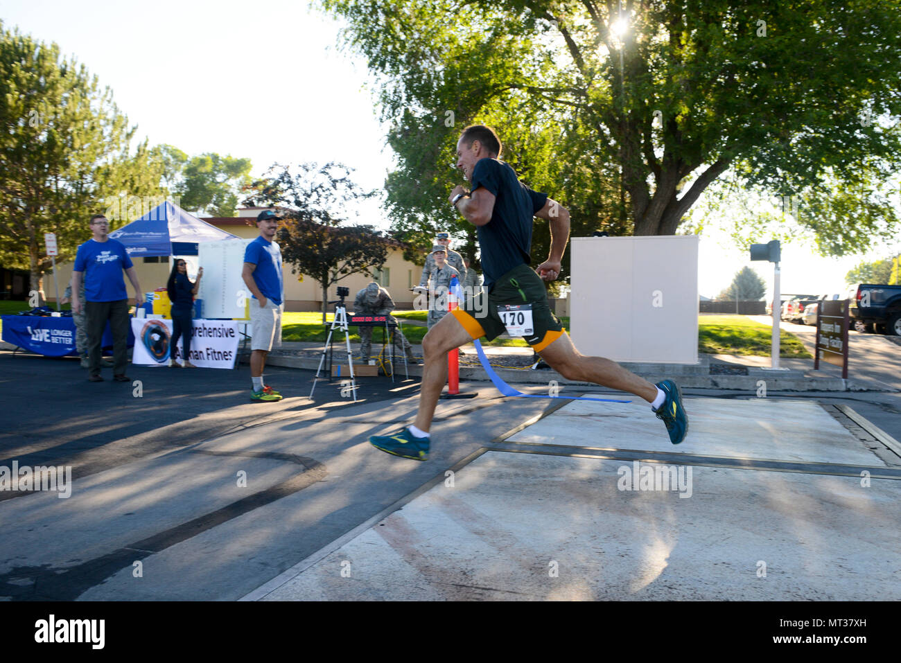 Derek Sharrell, Kingsley Field Fire Department assistant chief, dashes ...