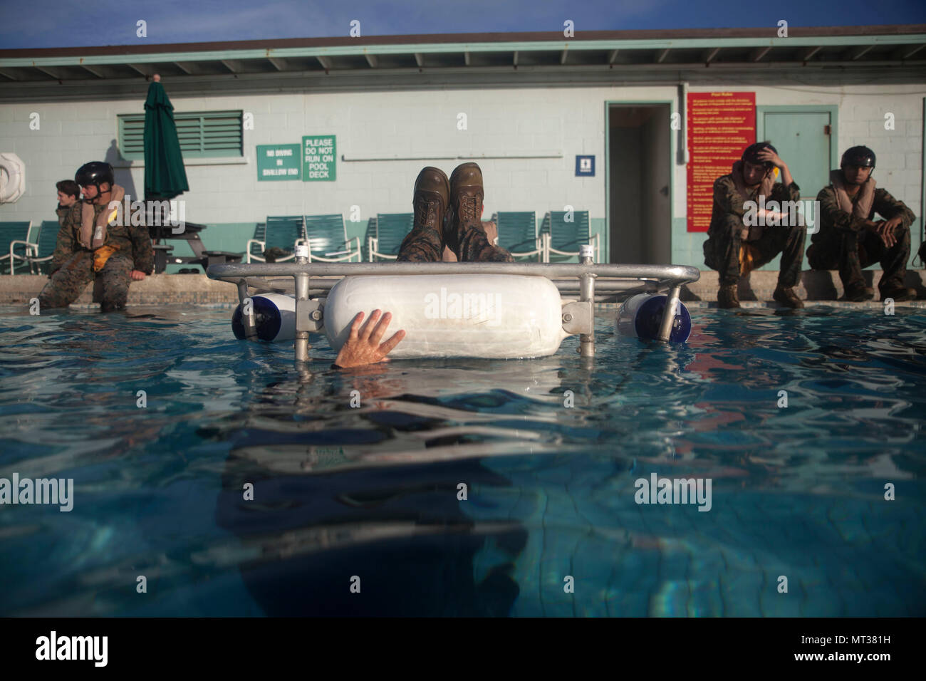 Cpl. Edward Moore, a supply specialist with 3rd Marine Regiment, 3rd ...