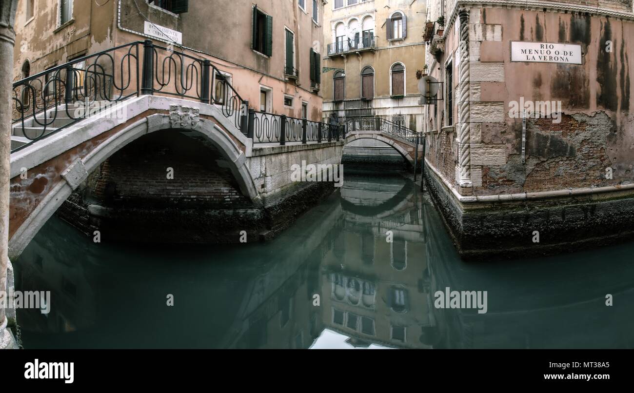 Canal crossing and pedestrian bridge in Venice Stock Photo - Alamy