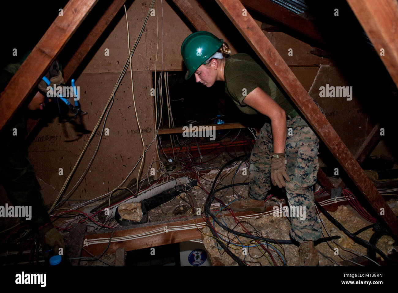 U.S. Marine Cpl. Dana L. Deline, a combat engineer with the Belize ...