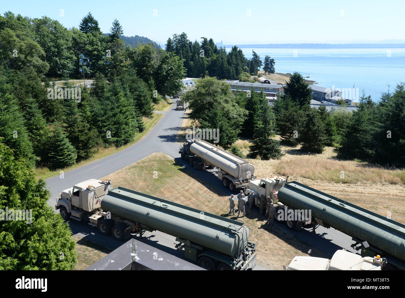 MANCHESTER, Wash.—A convoy of fuel trucks from the 475th Quartermaster ...