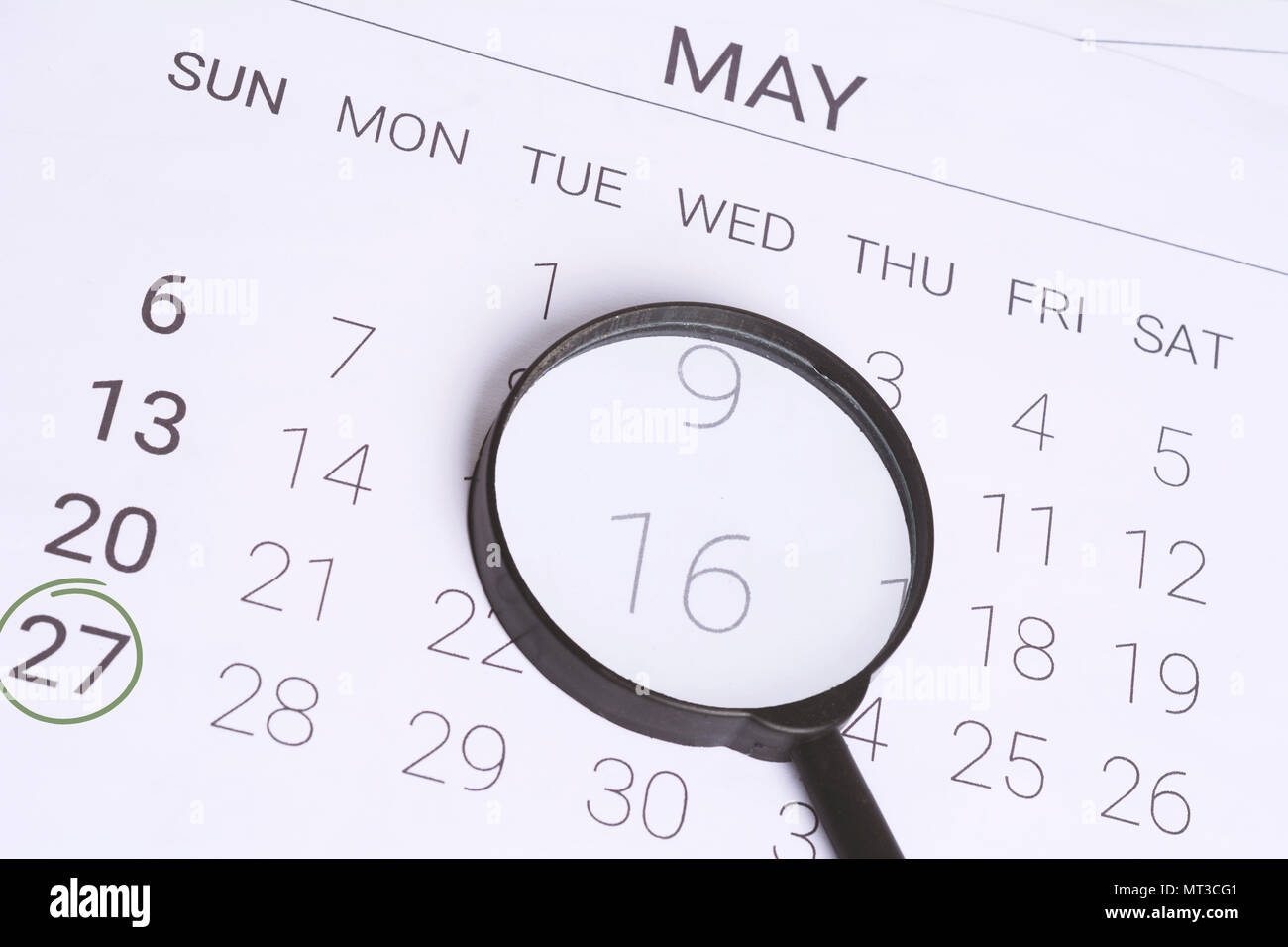 Magnifying calendar hi-res stock photography and images - Alamy
