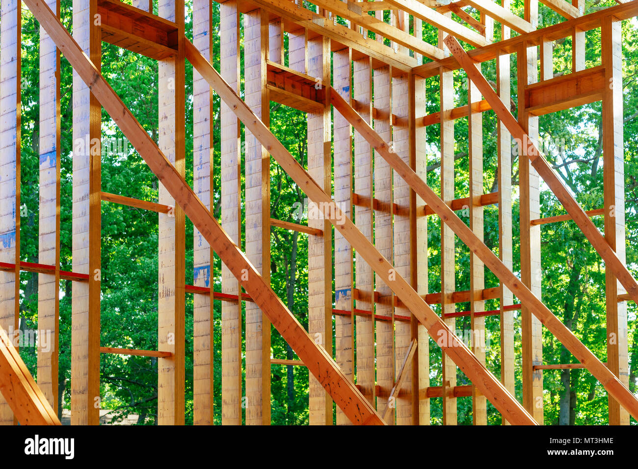 Wood frame interior of a new house under construction Stock Photo - Alamy