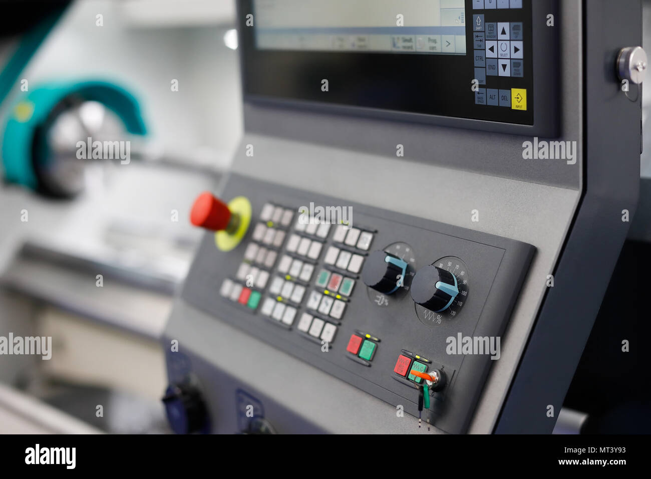 Control panel of the CNC lathe machine. Selective focus Stock Photo - Alamy